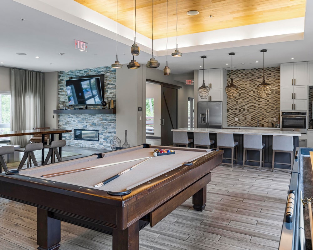 A deluxe apartment tenant lounge with bar games